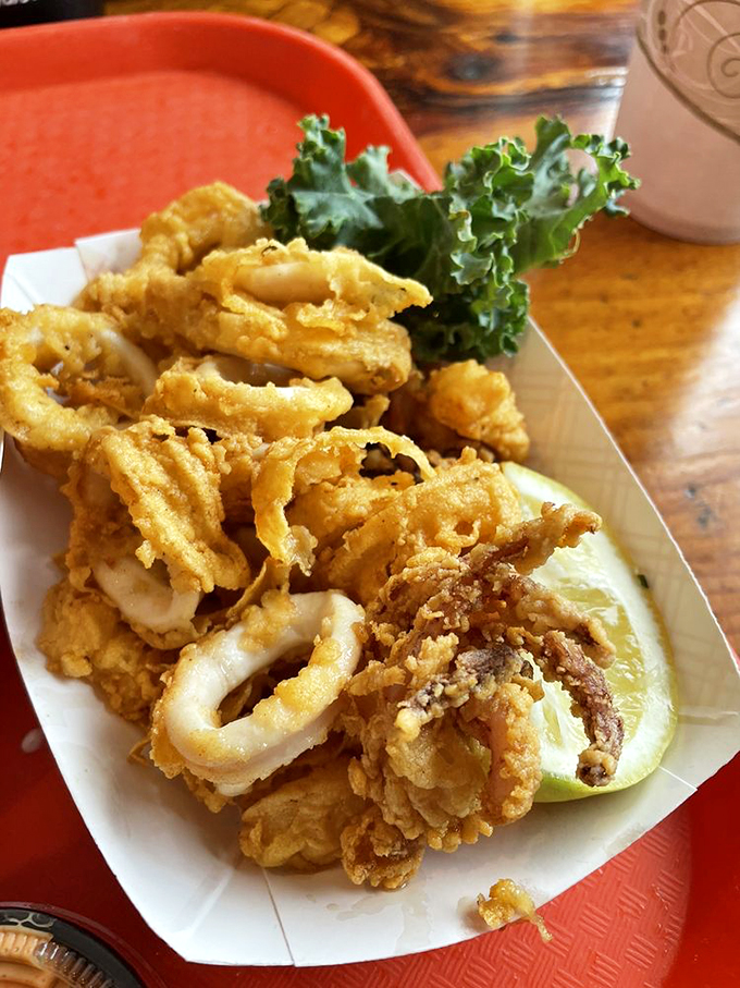Golden-fried rings of perfection that would make an Italian nonna nod in approval, served with a lemony kick.