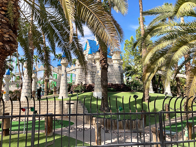 Medieval meets modern! This castle facade stands proudly among the palms, a whimsical backdrop for your next Instagram post.