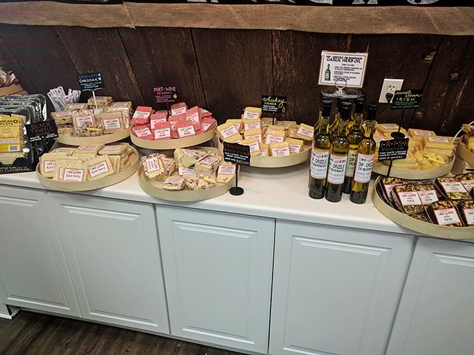 Say cheese! This display is a cheese lover's dream, with wheels and wedges galore. It's like a dairy version of the Wheel of Fortune, where everyone's a winner.