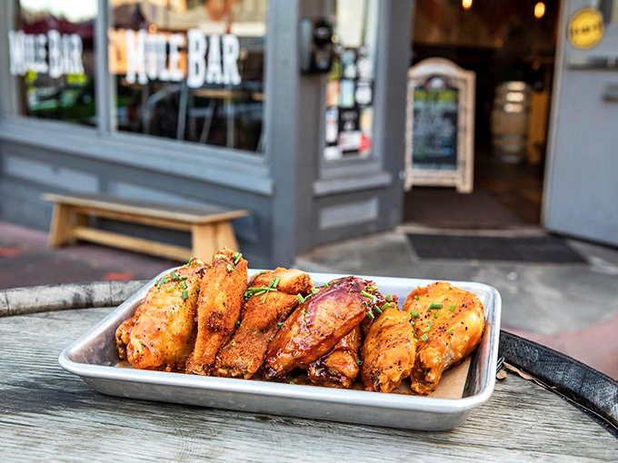 Wings so good, they'll make you want to flap your own arms with joy. These crispy, saucy delights are proof that chickens are the unsung heroes of bar food.
