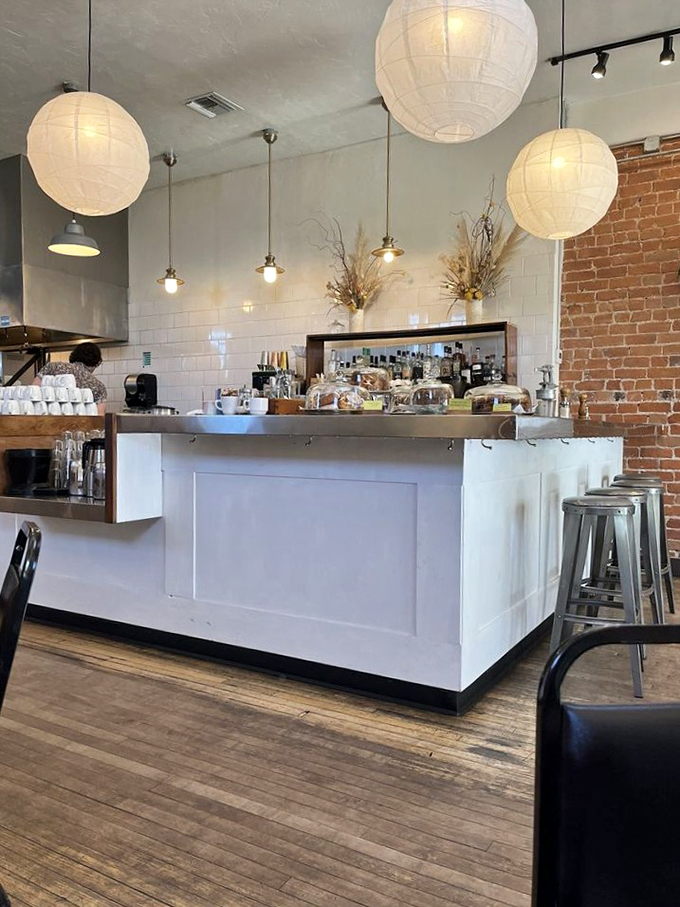 Clean lines and warm wood create a welcoming space where coffee dreams come true.