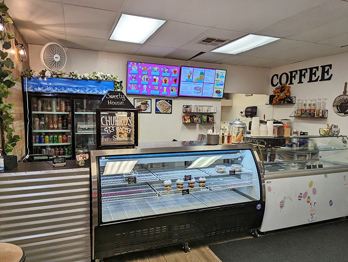 A dessert lover's command center, complete with digital menus and display cases full of temptations.