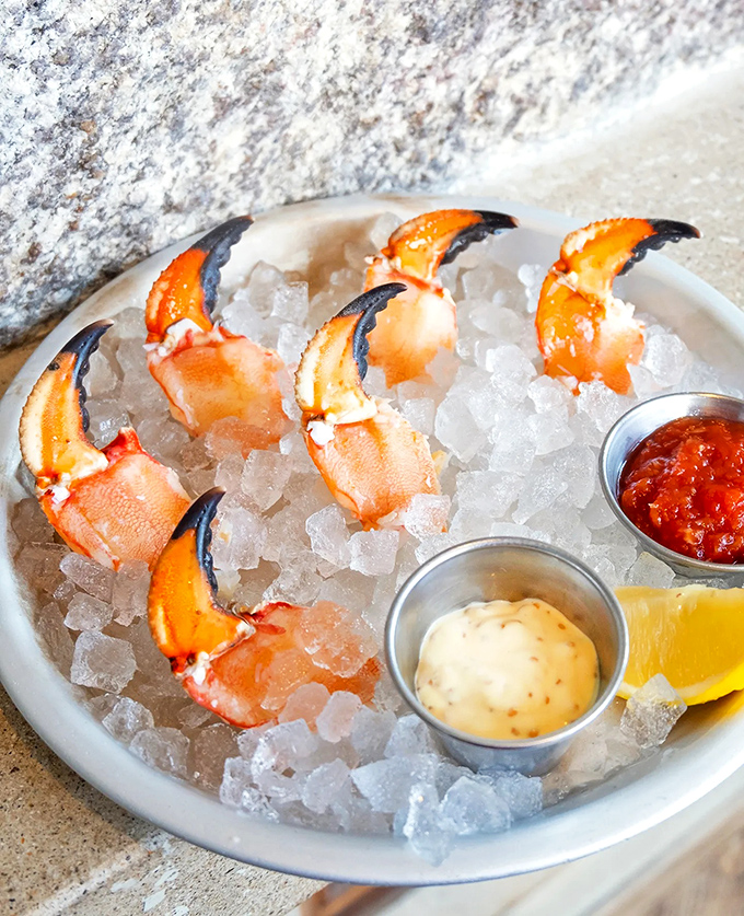 Stone crab claws on ice – nature's version of finger food, served with classic dipping sauces.