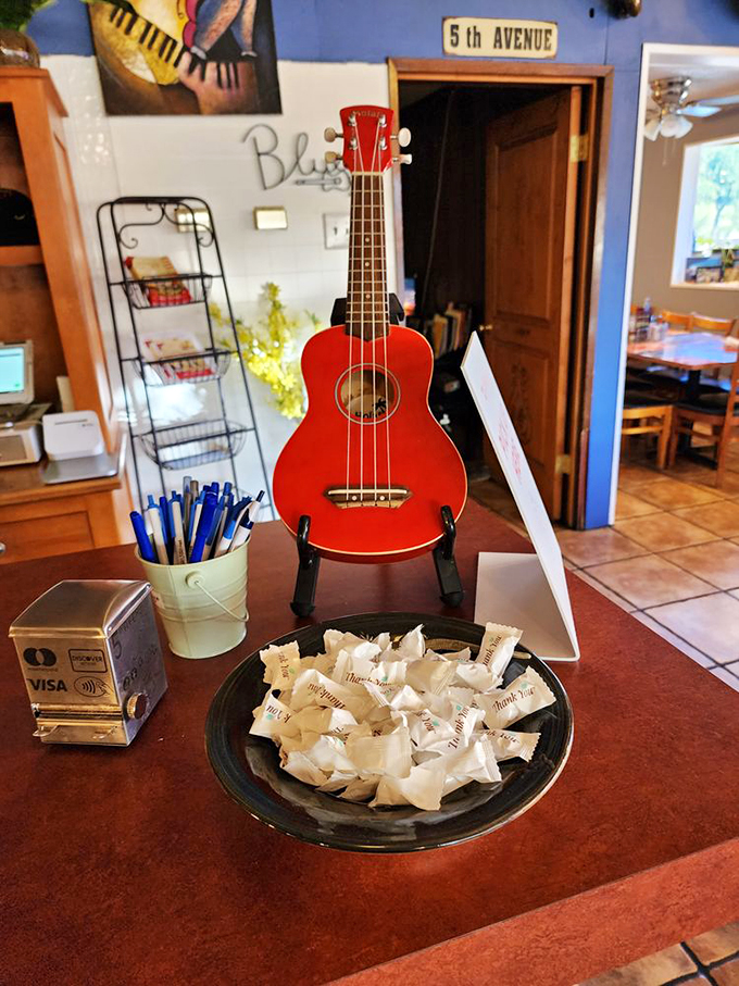 Is it a diner or a music store? At 5th Avenue Cafe, it's both! This red ukulele adds a playful note to the already melodious atmosphere. Photo credit: Mike B.