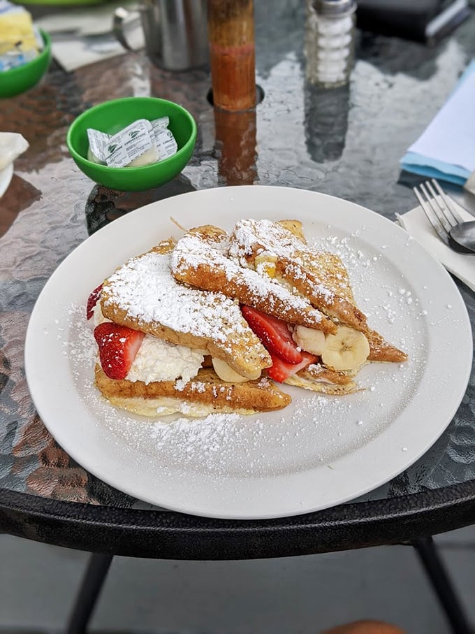 French toast triangles stuffed with fresh fruit and cream – dessert masquerading as breakfast, and we're not complaining.