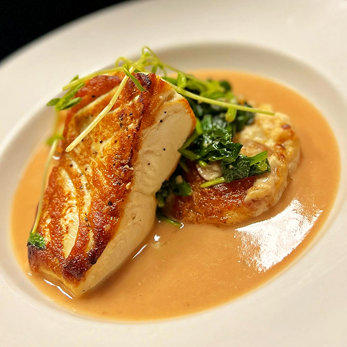 Pristine white fish meets colorful accompaniments in this picture-perfect plate of New England excellence.