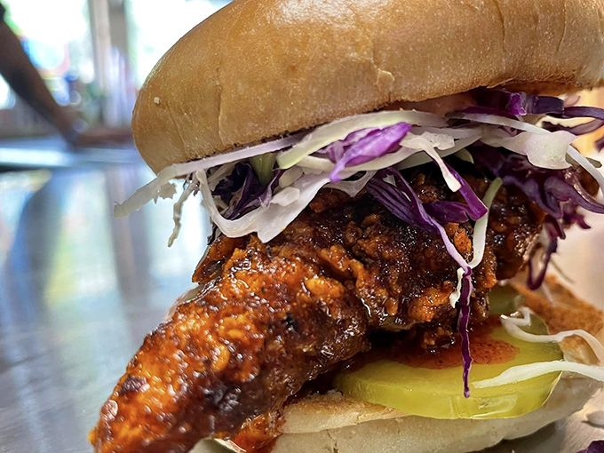 Purple slaw adds a cool crunch to this spicy sensation. It's Nashville heat meets New England neat.