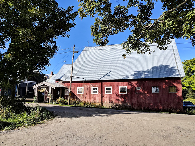 This weathered red barn with its silver roof has been transformed into a gathering place for craft beer enthusiasts.