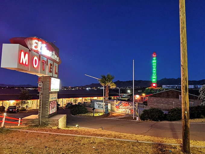 When the sun goes down, the neon lights up! El Trovatore's nighttime glow is a beacon for road-weary travelers and night owls alike. 