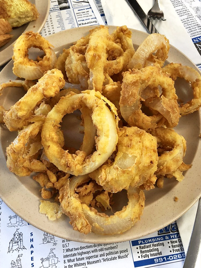 These onion rings aren't just crispy - they're crunchier than walking on fresh snow. Pure golden-fried happiness.