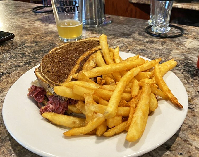This Reuben and those perfectly golden fries are what lunch dreams are made of.