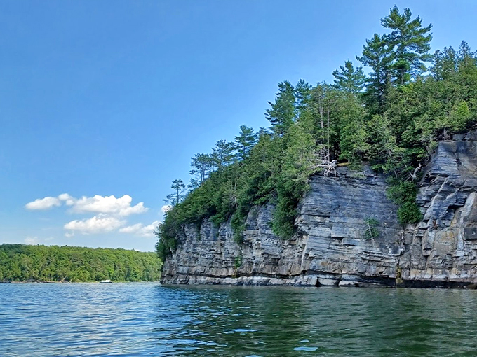 Towering cliffs meet tranquil waters in a geological tango that's been millions of years in the making. Talk about a long-term relationship!