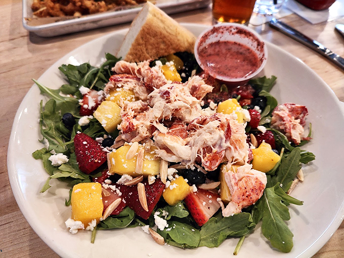 A summer salad that proves lobster can be refreshing: mixed with fresh fruit and greens for a lighter take.