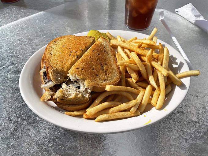 A sandwich that requires both hands and a strategy session before attempting to eat it. Worth every delicious bite. Photo credit: Lea C.