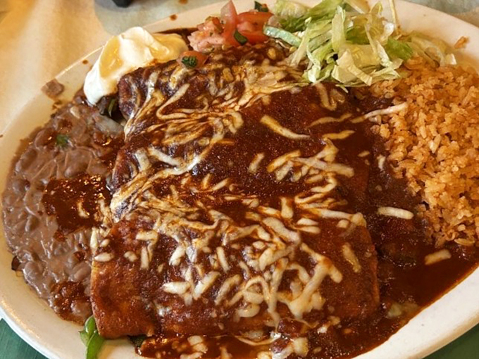 These enchiladas swimming in rich sauce tell the story of generations of Mexican cooking tradition.