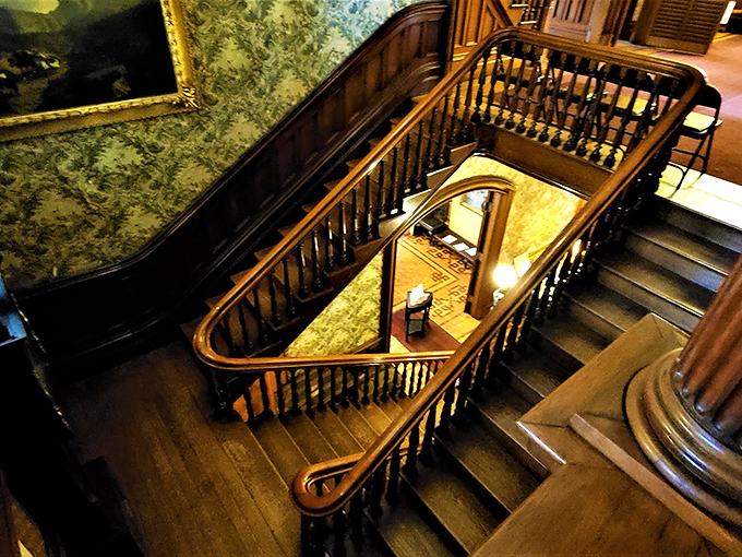 This spiral staircase has witnessed more grand entrances than a Hollywood red carpet.
