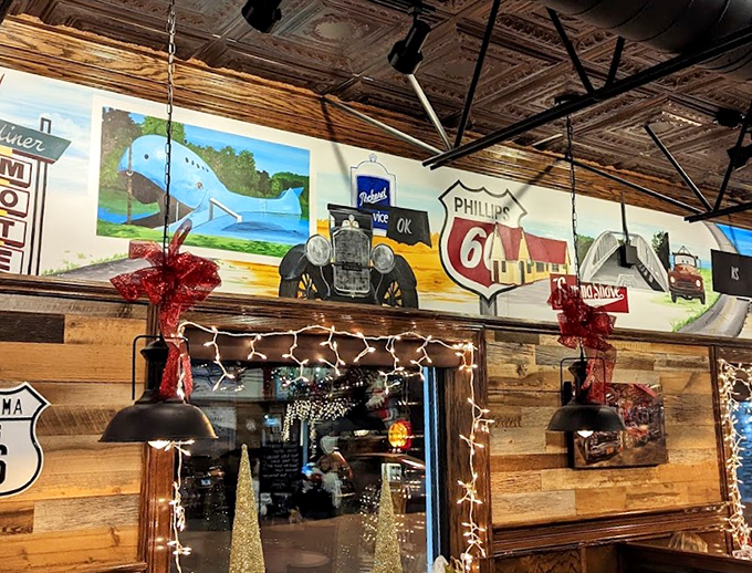 Classic motel signs and roadside attractions paint a picture of America's favorite highway right on the walls.