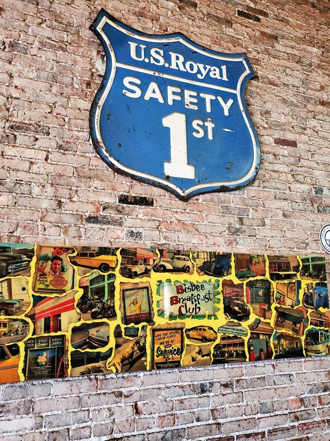 Vintage signs and memorabilia create a museum-like timeline of Bisbee's colorful past on these historic brick walls.