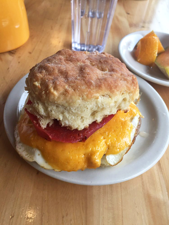 Biscuits so fluffy, they could double as pillows. This sandwich isn't just breaking fast, it's breaking records for most mouthwatering morning meal.