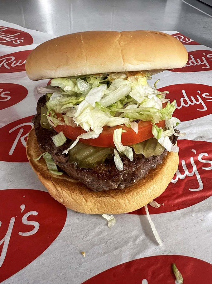 This burger's got more layers than a 1950s petticoat! Rudy's Buffalo Burger is a towering testament to the art of stack-ability.