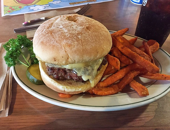 Hold onto your napkins, folks! This burger is about to take your taste buds on a flavor rollercoaster that would make even Elvis say, "Thank you, thank you very much."