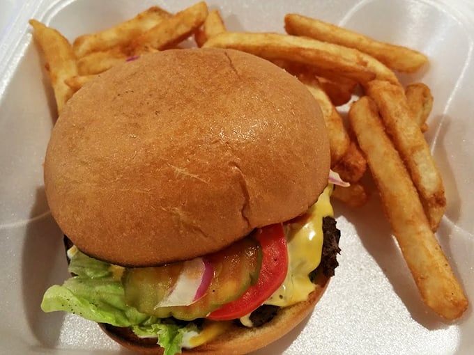 Burger bliss awaits! This beauty is dressed to impress, with layers that would make a millefeuille pastry jealous.