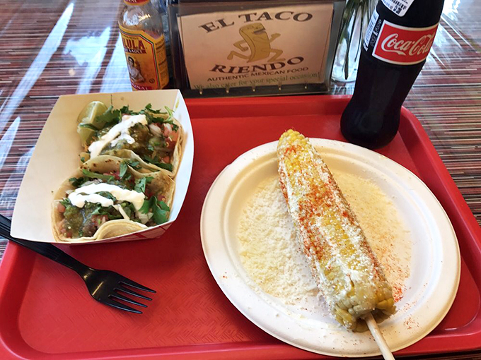 Corn on the cob, street-style! This isn't just corn, it's a handheld flavor grenade ready to explode with zesty, cheesy goodness.