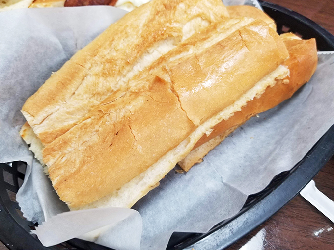 This Cuban bread isn't just a side, it's the main event. It's so good, it could make a sandwich jealous. Photo credit: Manolo Hernandez