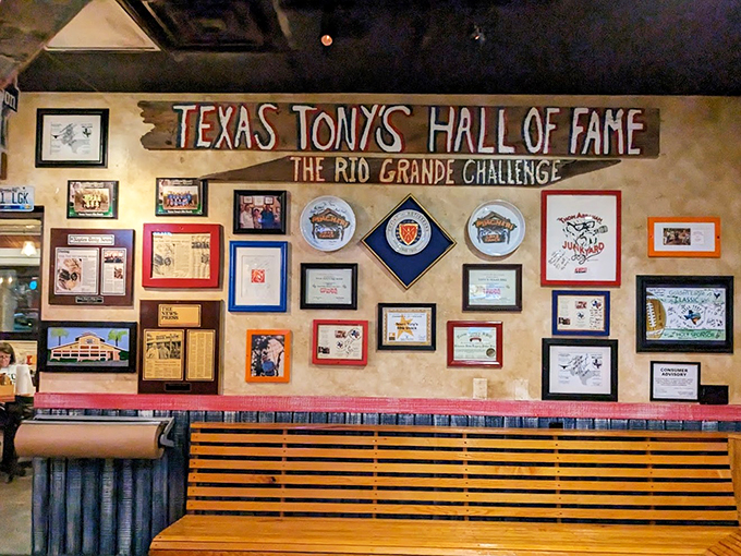 Wall of fame or hall of flame? This decor is a testament to Texas Tony's legendary status in the barbecue world.