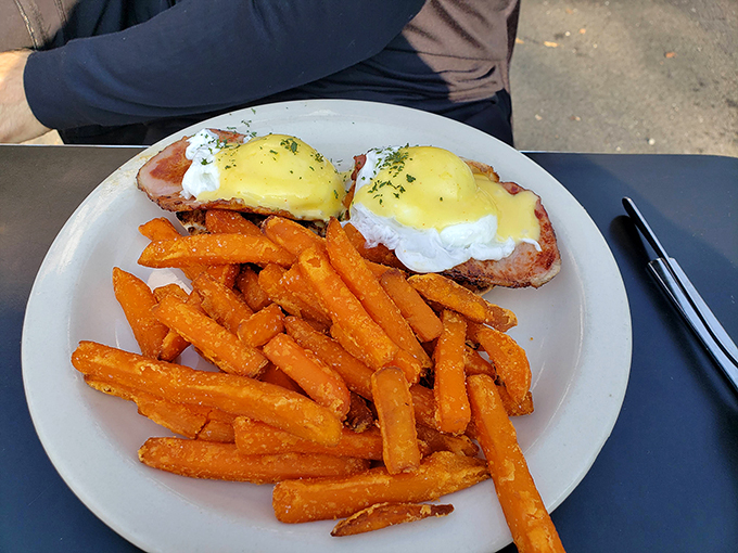 Eggs Benedict with a side of crispy fries &ndash; because sometimes you need to balance your fancy with some down-home comfort.