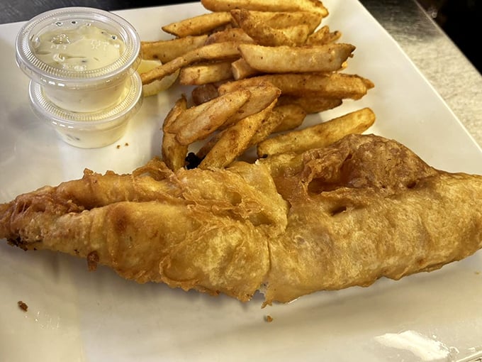 The Friday Fish Fry: A Wisconsin tradition that's got more fans than cheese curds at a state fair. Crispy, flaky, and utterly irresistible!