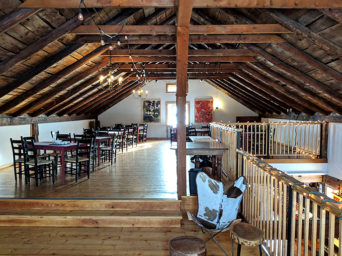 Dine among the rafters in this Pinterest-worthy loft! It's the perfect spot for swirling, sipping, and pretending you're in a chic treehouse for grown-ups.