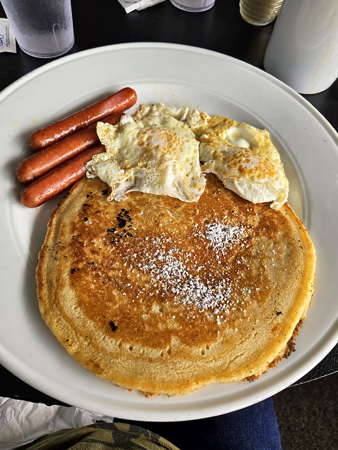 Pancake perfection: A golden disc of joy that could double as a life raft in a sea of maple syrup. Bonus points for the protein sidekicks.