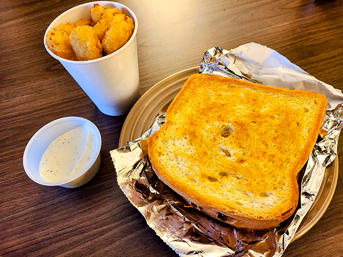 Cheese pull for the soul! This patty melt isn't just a sandwich, it's a work of art that belongs in the Louvre... of lunch.