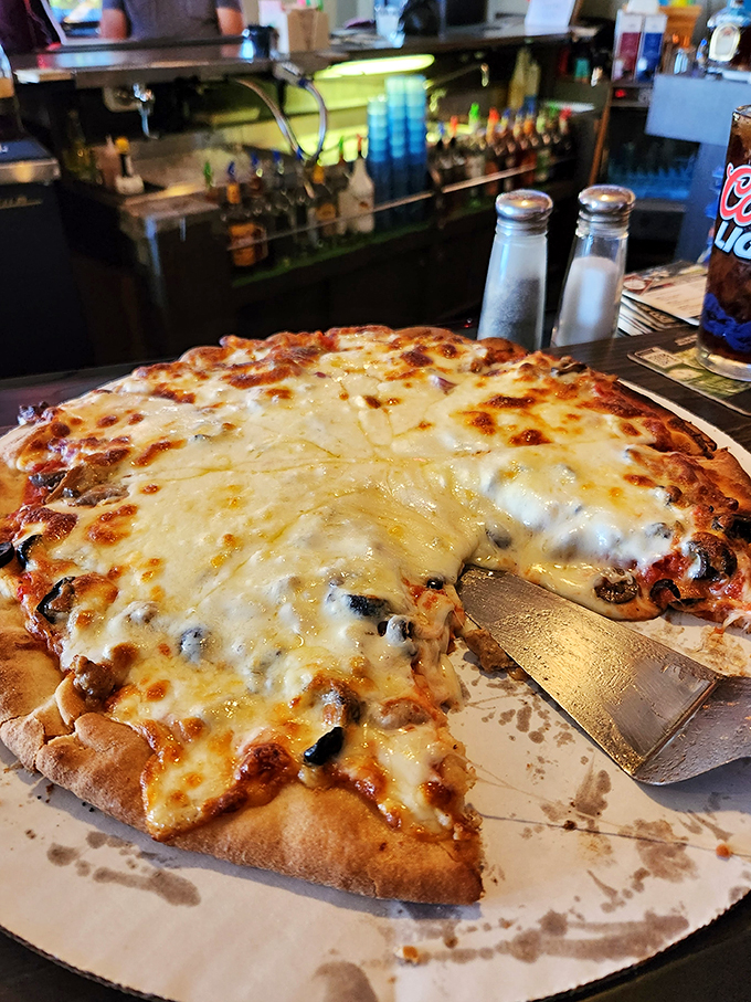 Pizza that's a cut above the rest! With cheese for days and a crust that's just right, it's like a round, edible hug.