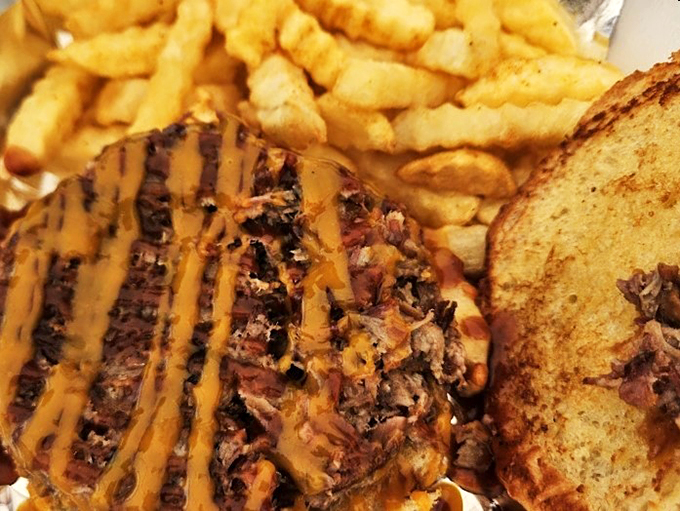 Pork perfection on a bun! This sandwich is stacked higher than your grandpa's stories about "the good old days."