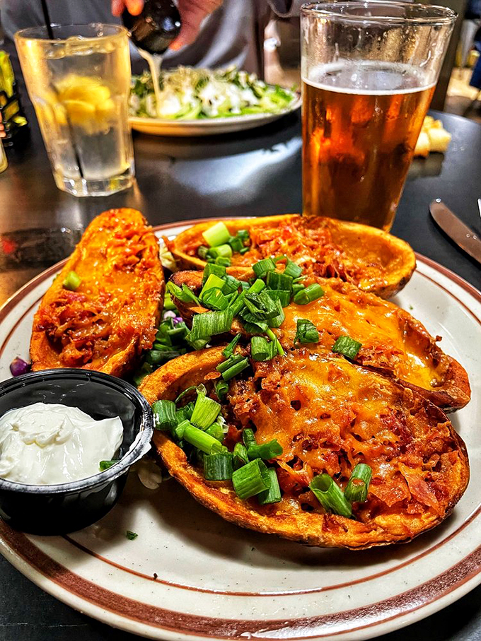 Potato skins that'll make your taste buds do the two-step! Crispy, cheesy, and loaded with more toppings than a rodeo queen's hat.