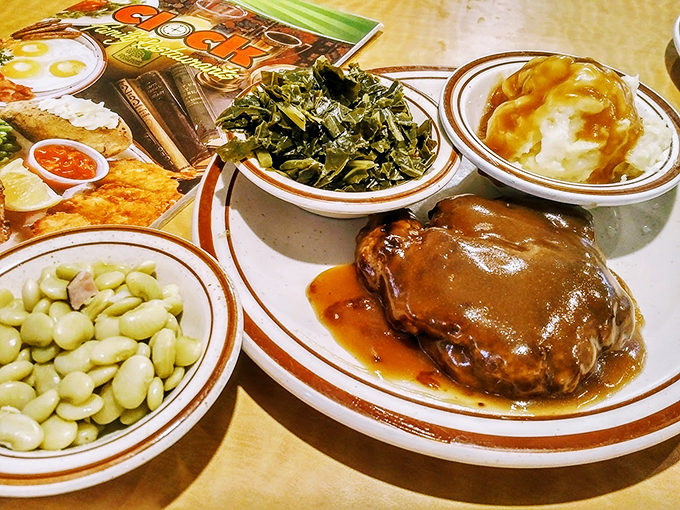 A feast fit for a Floridian king! Salisbury steak, collard greens, and butter beans&mdash;proof that sometimes, more is definitely more. Photo credit: Cristina Tringali