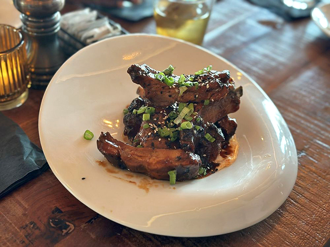 Sticky situation never tasted so good! These glazed ribs are what happens when pigs fly... into a vat of heavenly sauce. Photo credit: TIsh C.