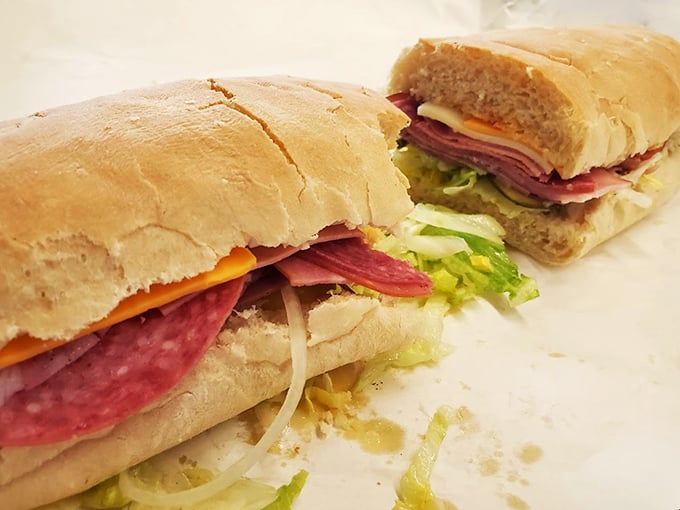 Layer upon layer of deli perfection. This sandwich isn't just stacked &ndash; it's practically skyscraper-ing its way to your heart.
