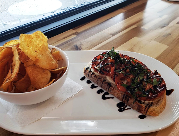 Artisanal toast gets dressed up with house-made chips - because sometimes simple pleasures need a little glamour.