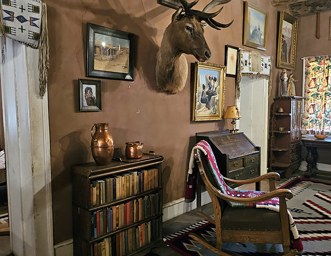 It's like Pinterest threw up in the Old West! This eclectic wall decor is what happens when cowboys discover their artistic side.