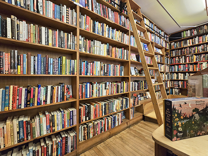 Wall-to-wall shelves create a book lover's paradise. It's like being hugged by literature, without the paper cuts!