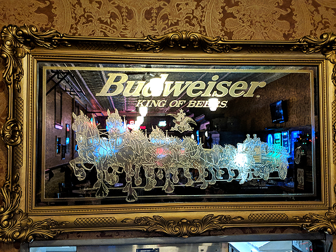 Giddy up and drink up! This Budweiser mirror isn't just bar decor&mdash;it's a gilded gateway to good times, framed by history.
