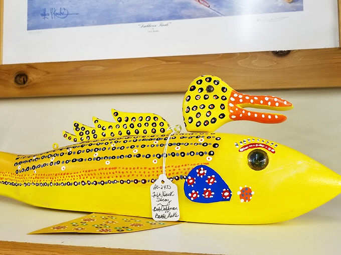 Is it a bird? Is it a fish? No, it's a whimsical folk art creation that's sure to spark conversation!