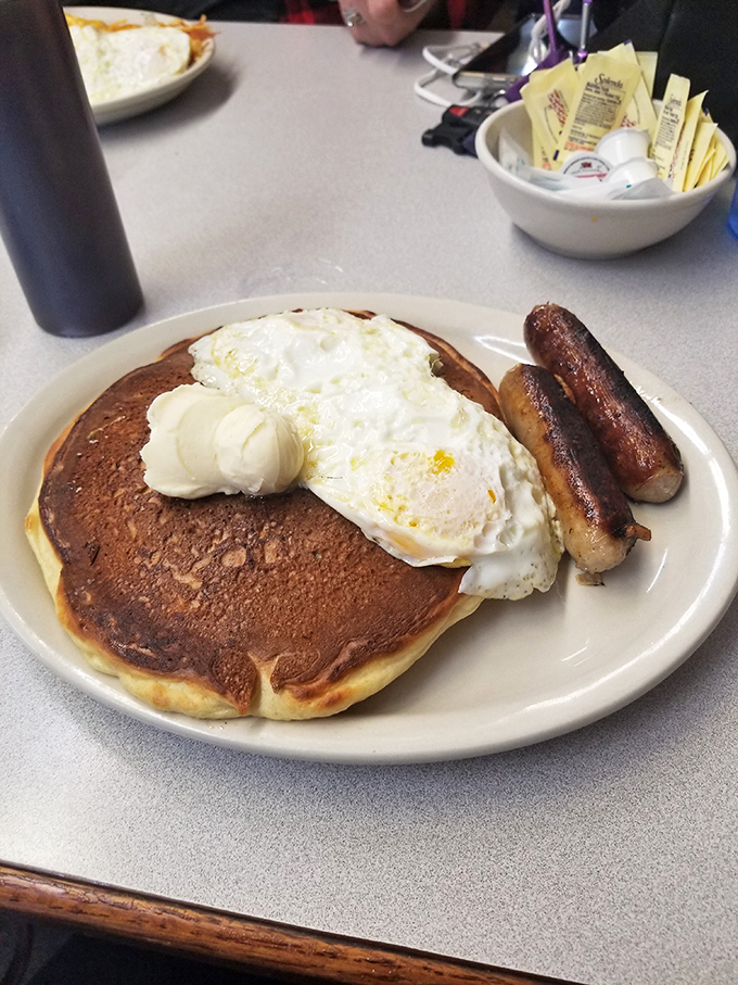 Pancakes so fluffy, they could double as pillows. Warning: May induce spontaneous naps and uncontrollable smiles.