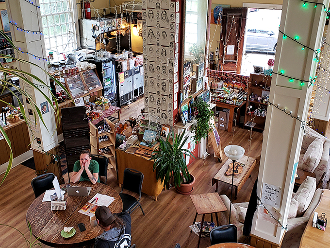 Eclectic elegance! From fairy lights to face sketches, this space is a Pinterest board come to life.