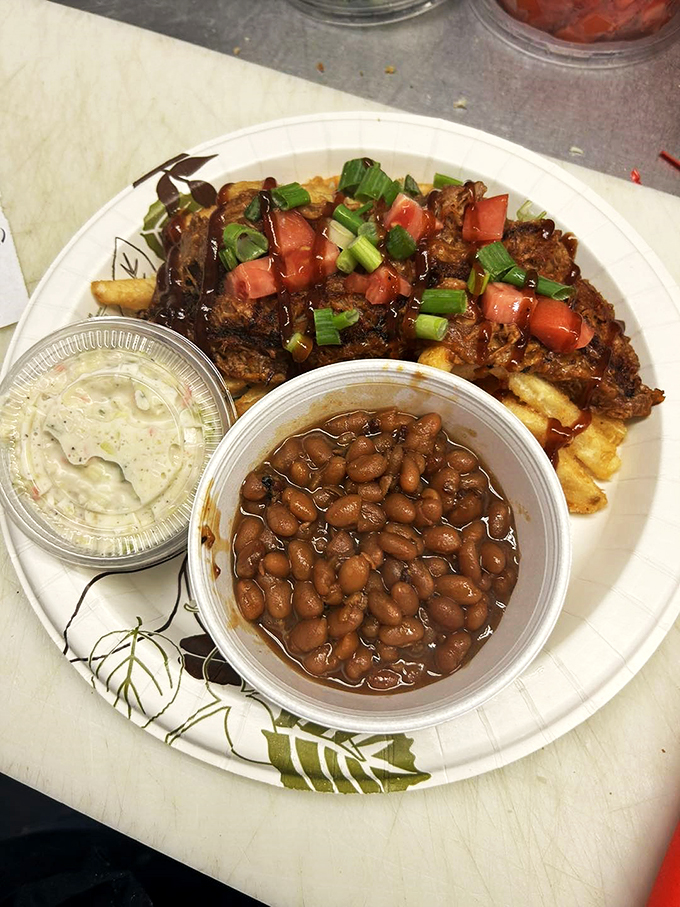 A plate that proves baked beans and coleslaw aren't just side dishes - they're essential supporting actors.