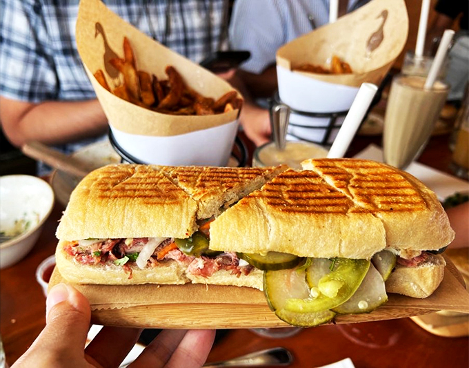 A sandwich that's dressed to impress, with pickled veggies and tender meat playing a perfect harmony.