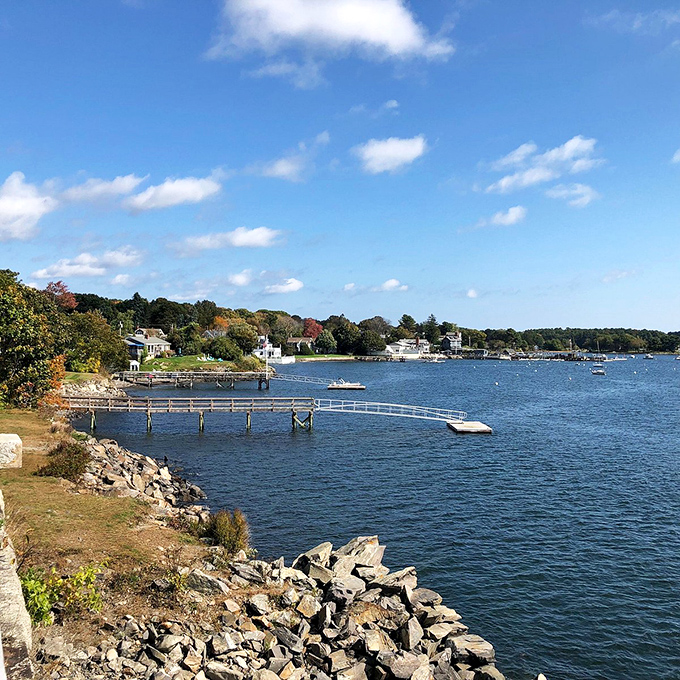 Wooden piers stretch into the bay like nature's welcome mat, inviting boats to drop anchor and stay awhile.